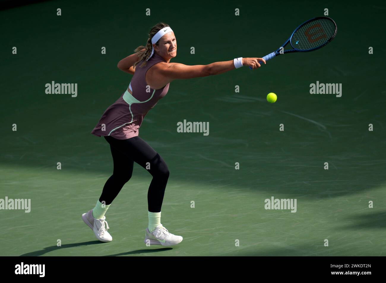 Victoria Azarenka returns the ball to Elena Rybakina of Kazakhstan ...