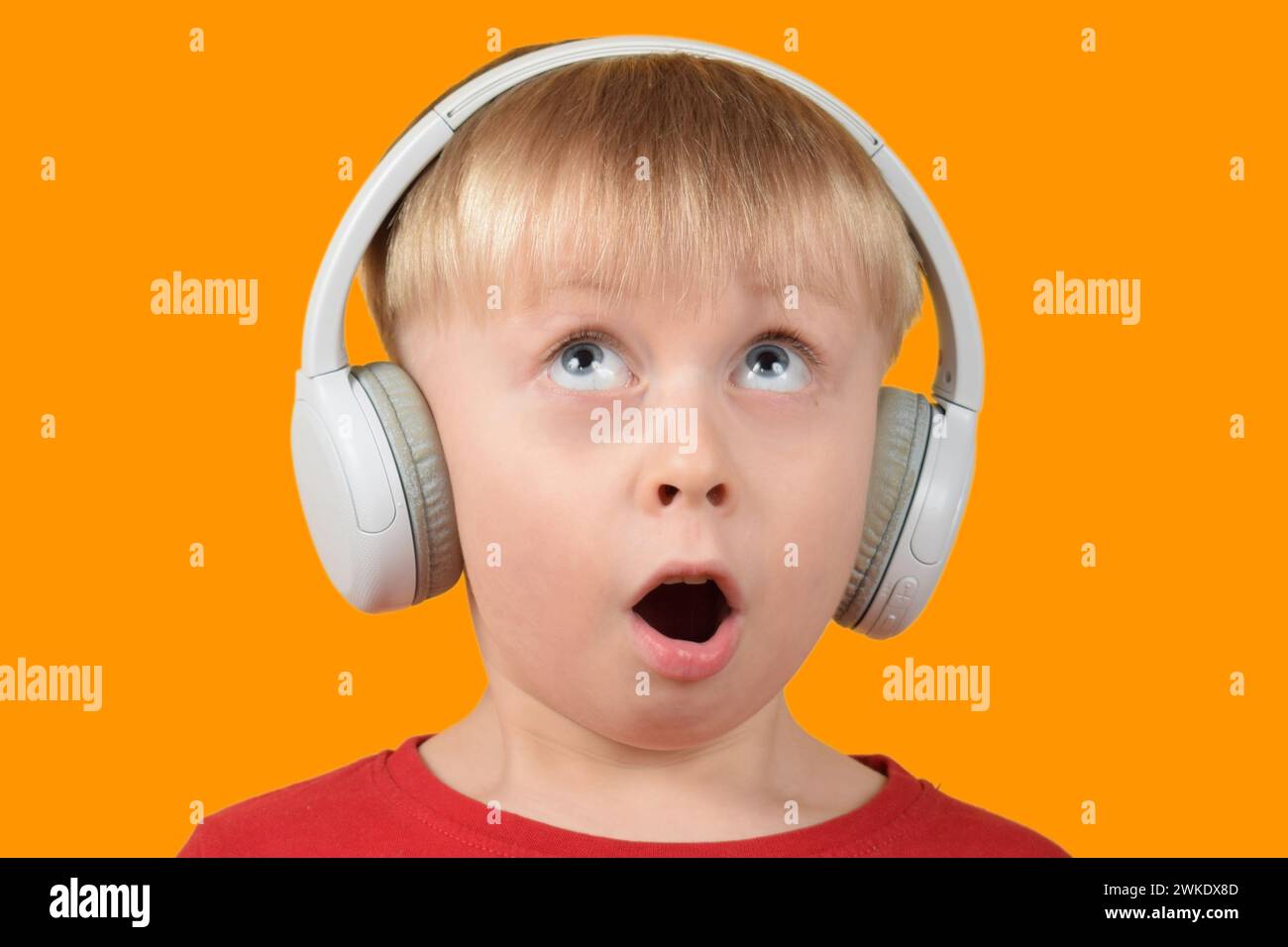 cute boy listening to music Stock Photo - Alamy