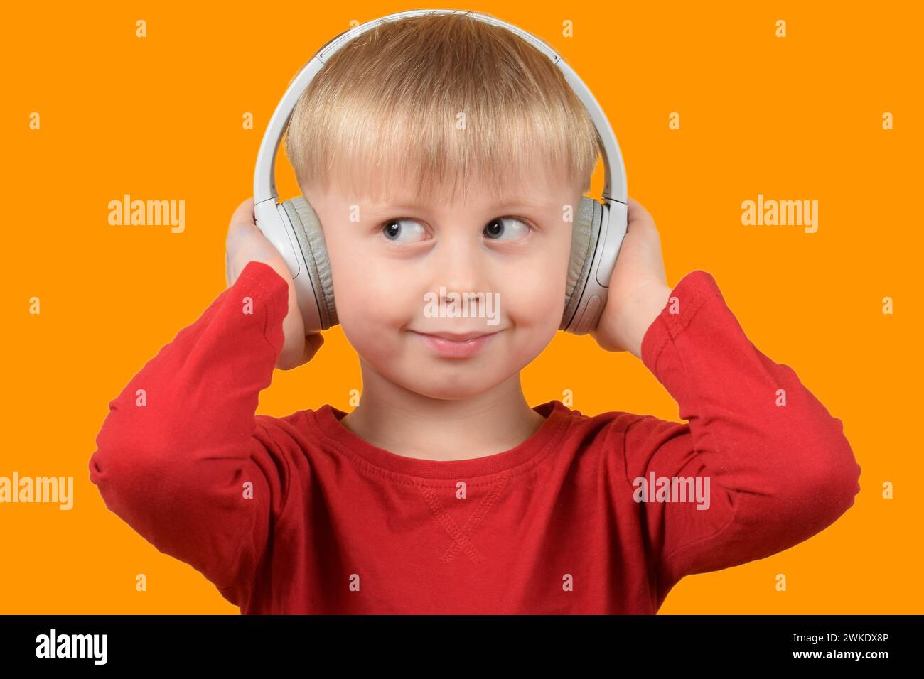 cute boy listening to music Stock Photo - Alamy