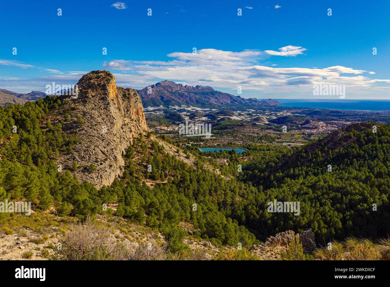 The coast and Polop from Val Guadar, the Costa Blanca, Spain, the most ...