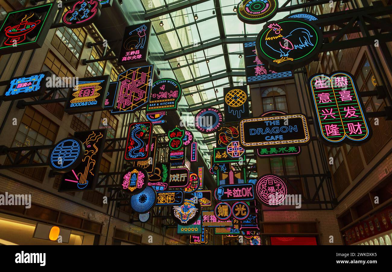 Neon signs advertising in Chinatown. Creative decor with light Chinese ...