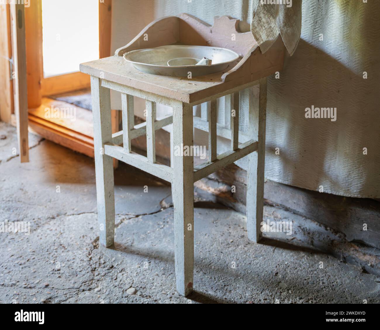 Vintage face wash stand with bowl. The interior of the sauna of an old ...