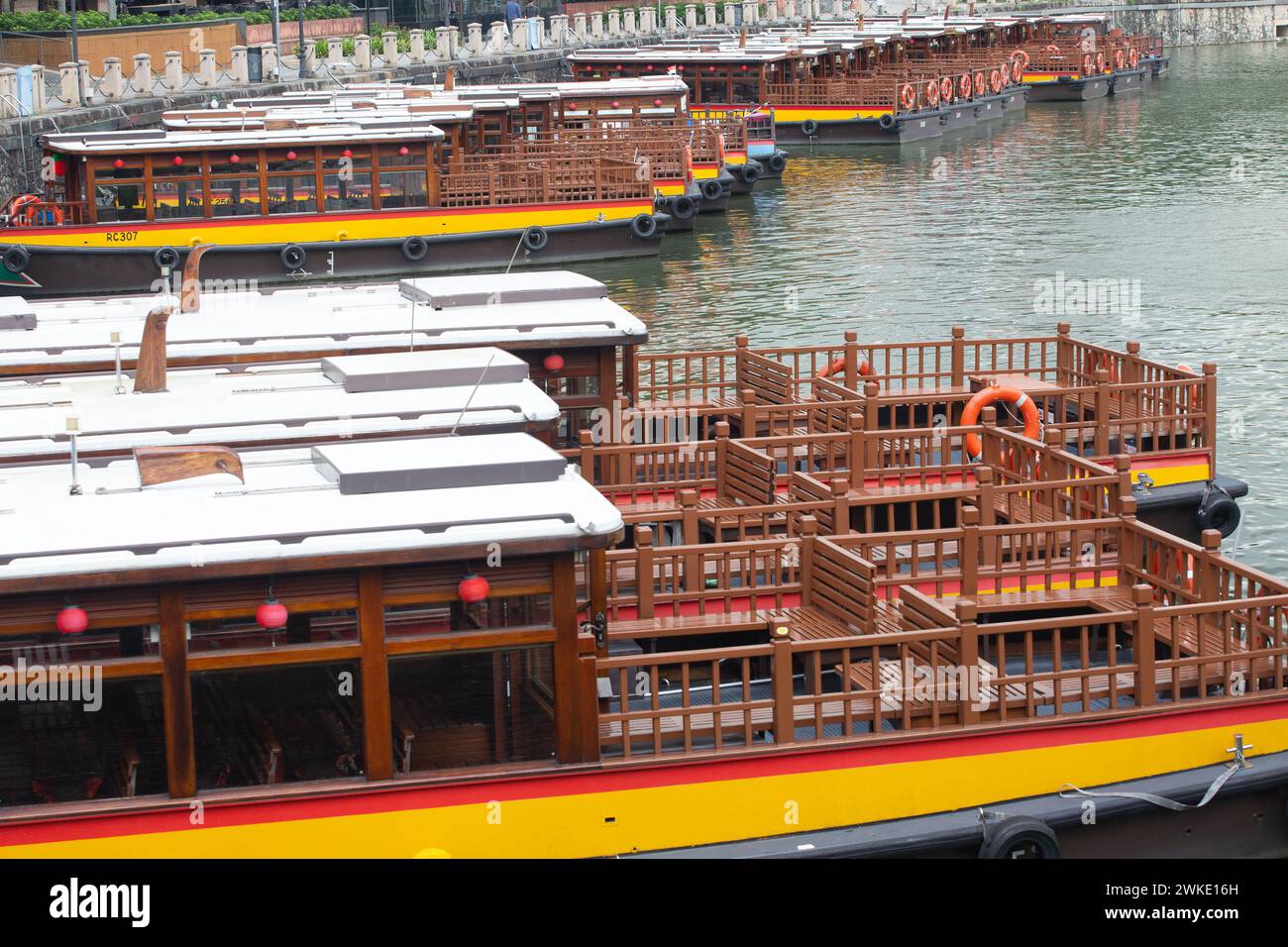 Close up of the stationary commercial cruise bum boats along Singapore ...