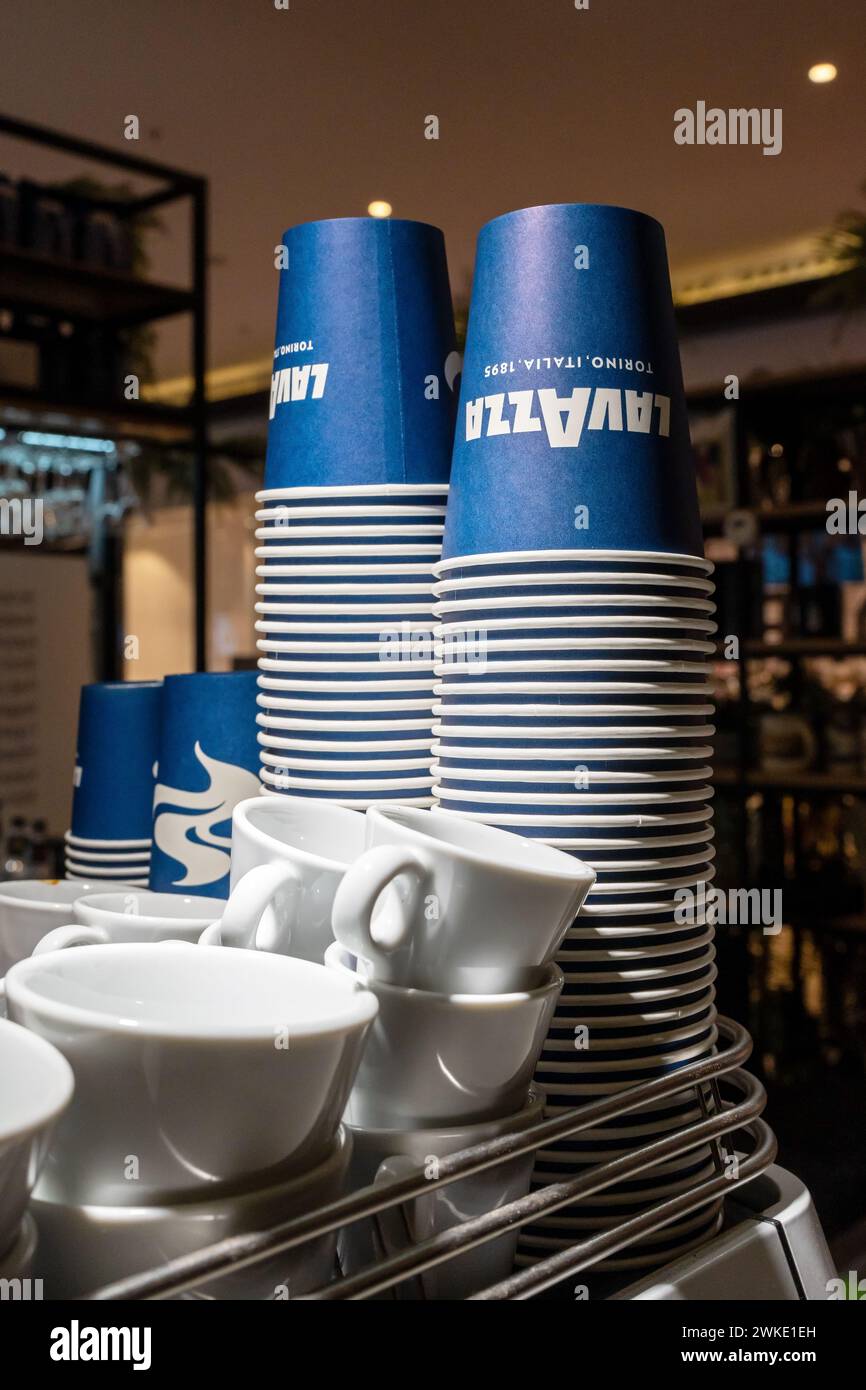 Lavazza brand logo on disposable coffee cups. Lavazza coffee paper cups ...