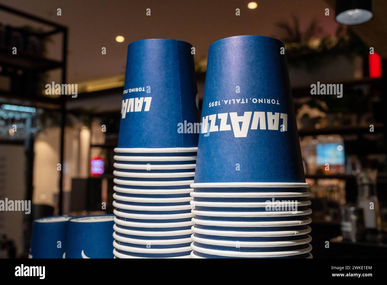 Lavazza brand logo on disposable coffee cups. Lavazza coffee paper cups ...