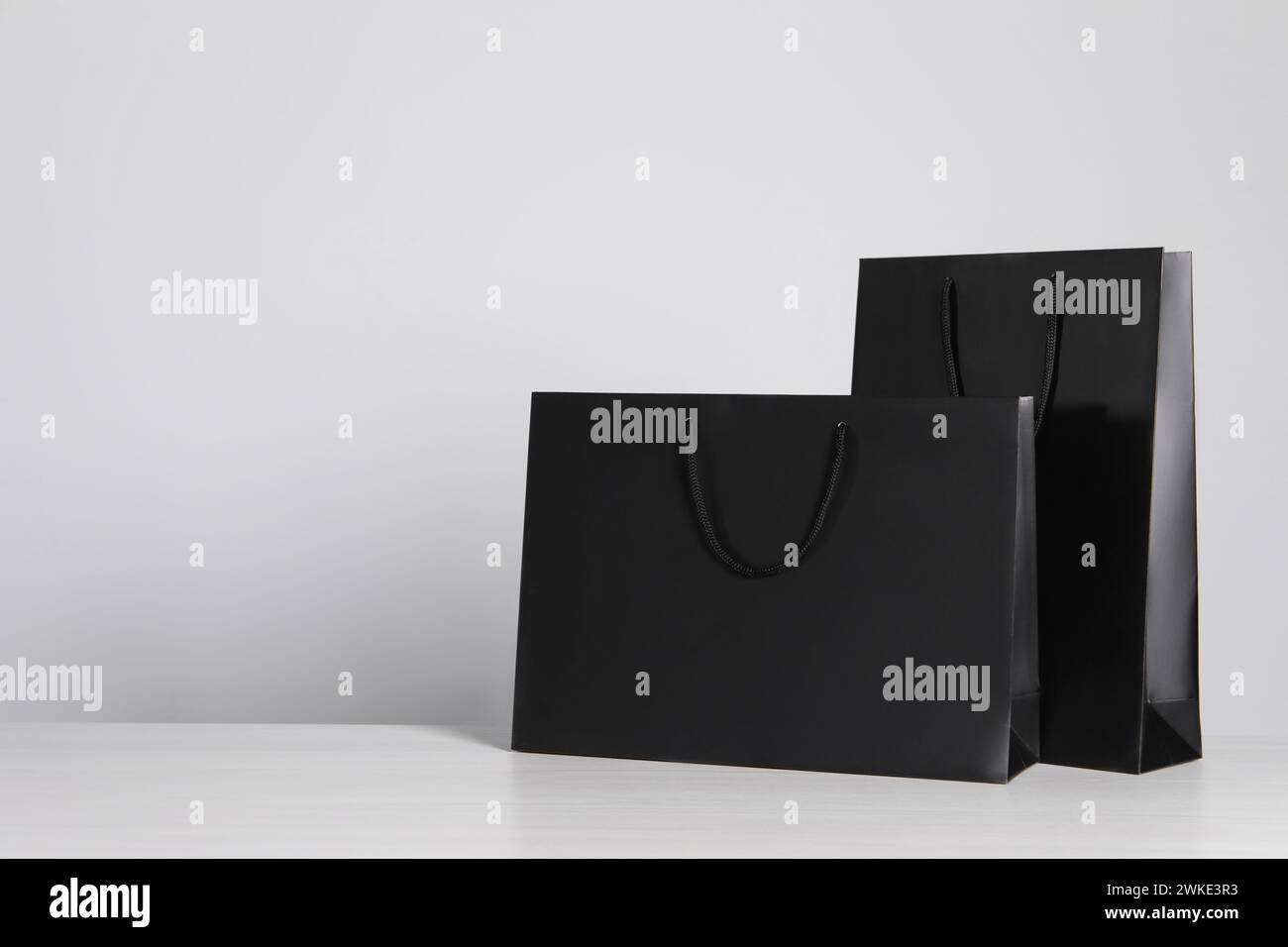 Shopping bags text black hi-res stock photography and images - Alamy