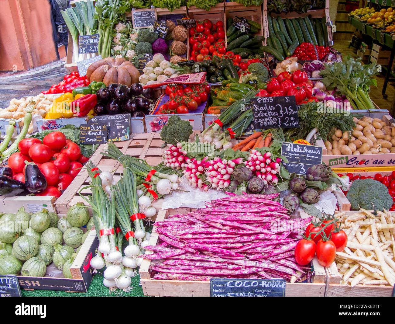 Vibrant assortment of fresh produce at the market. A colorful array of ...