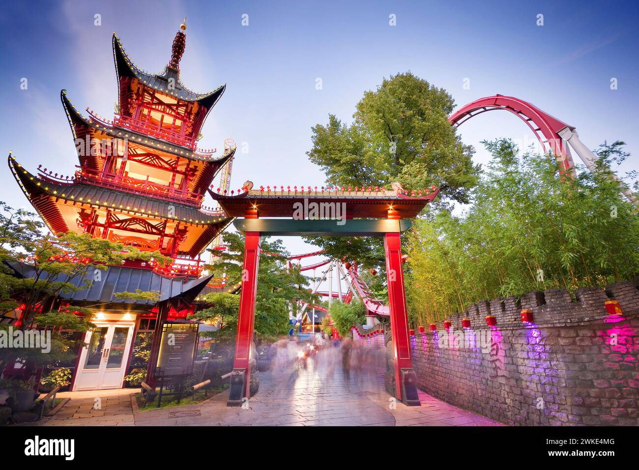 Chinese Tower and Dæmonen roller coaster in historical amusement park ...
