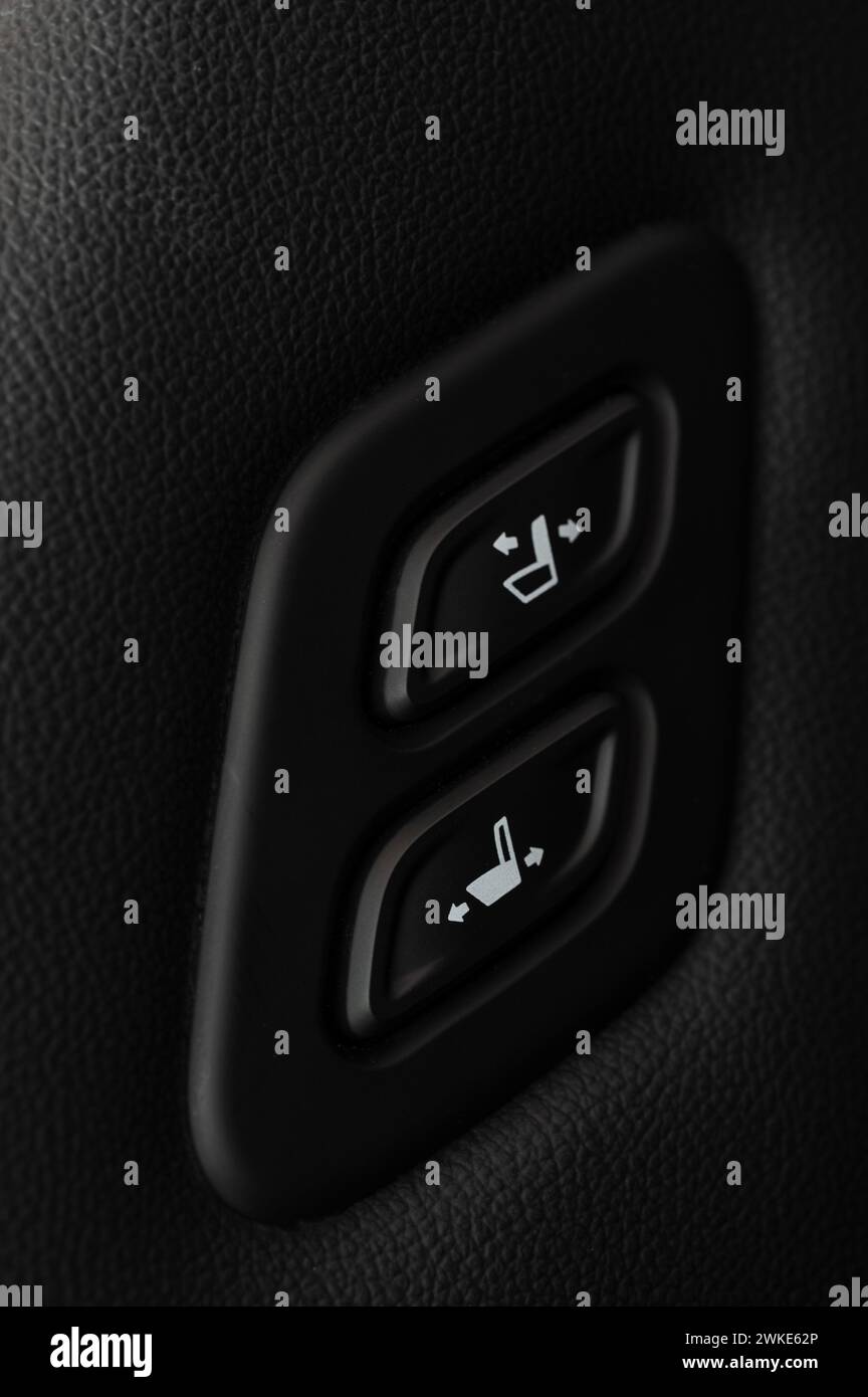Change position car chair switch buttons close up view on leather ... Change position car chair switch buttons close up view on leather ...
