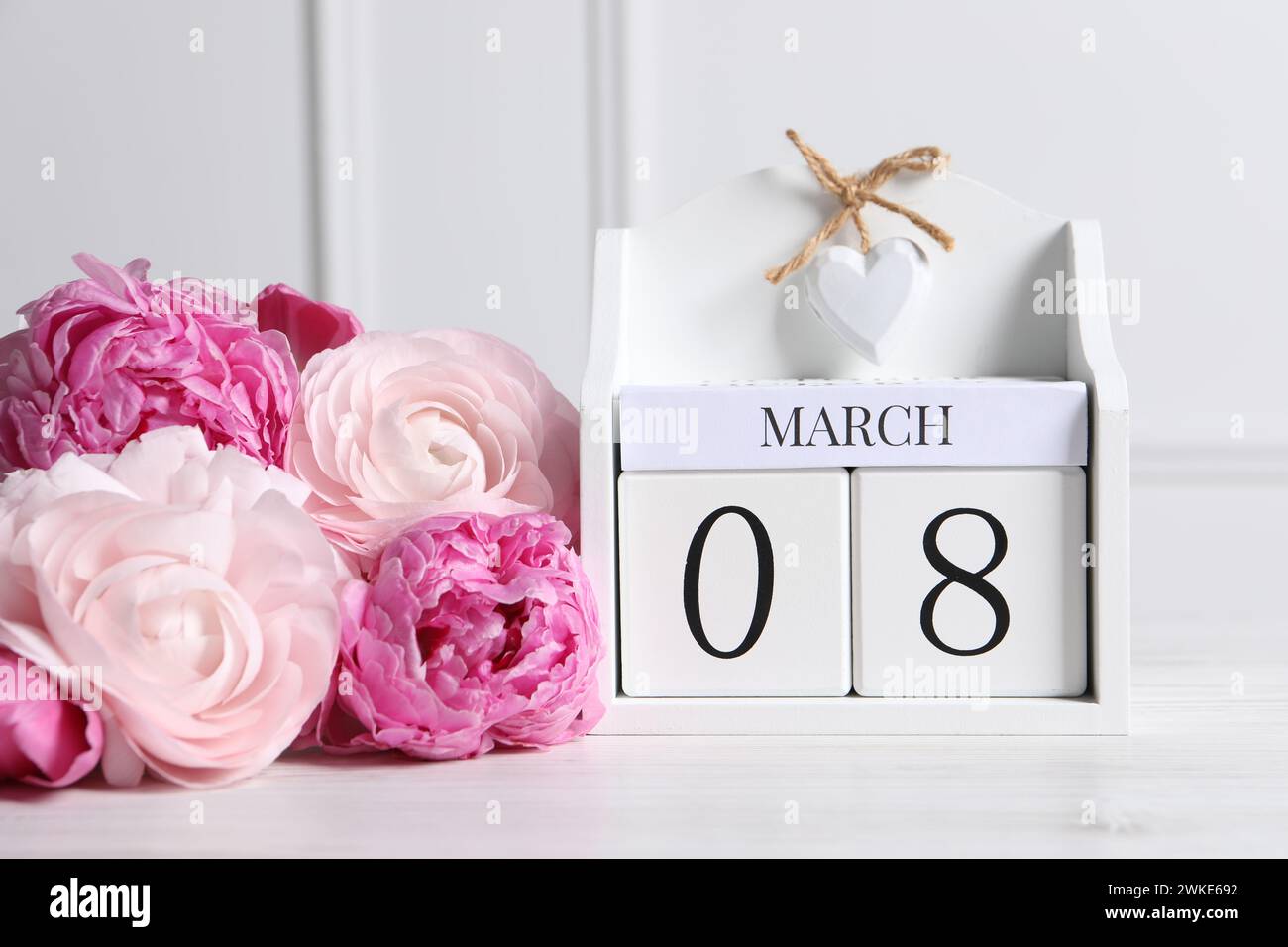 International Women's day - 8th of March. Wooden block calendar and ...