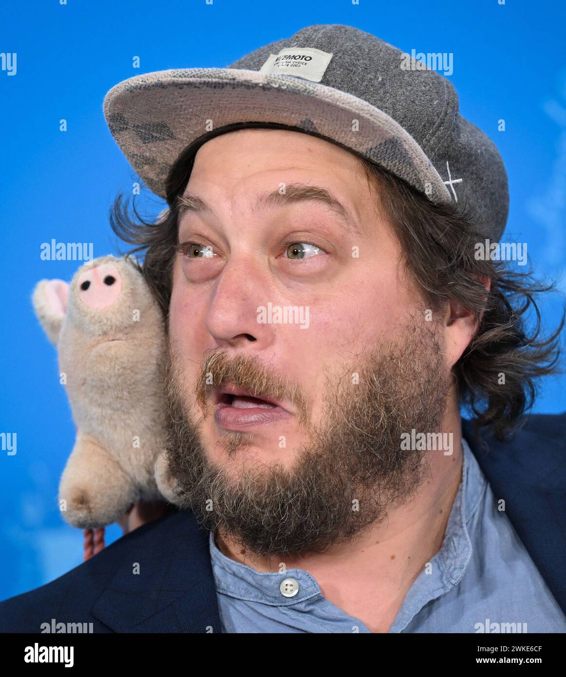 Berlin, Germany. 20th Feb, 2024. Actor David Scheid fools around during ...