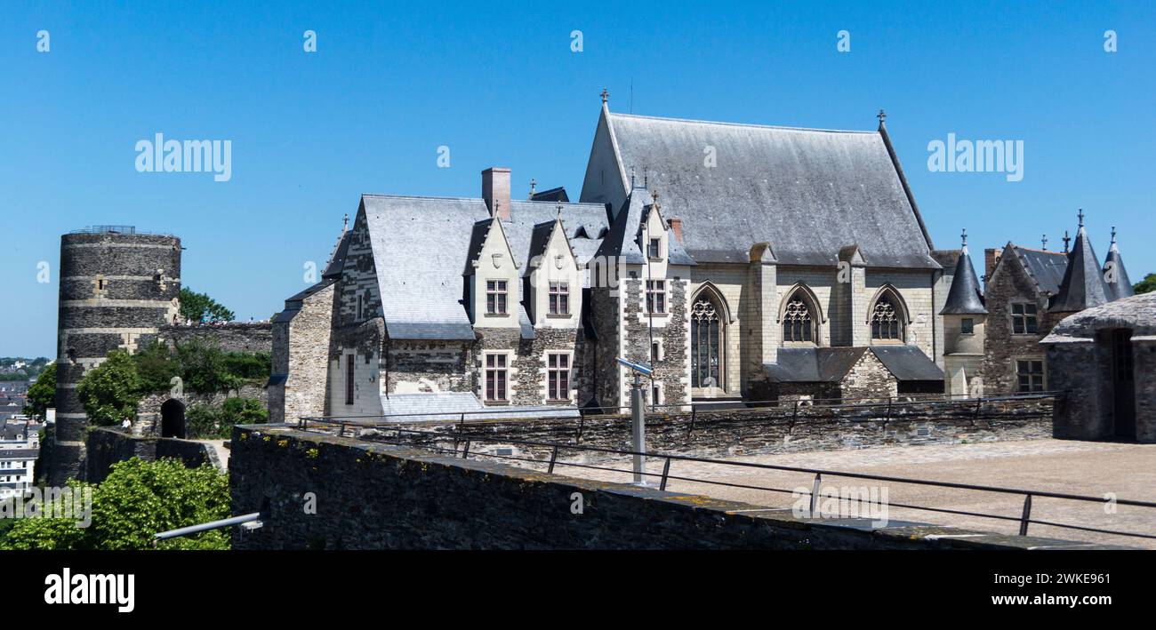 The castle of angers with its imposing towers Stock Photo - Alamy