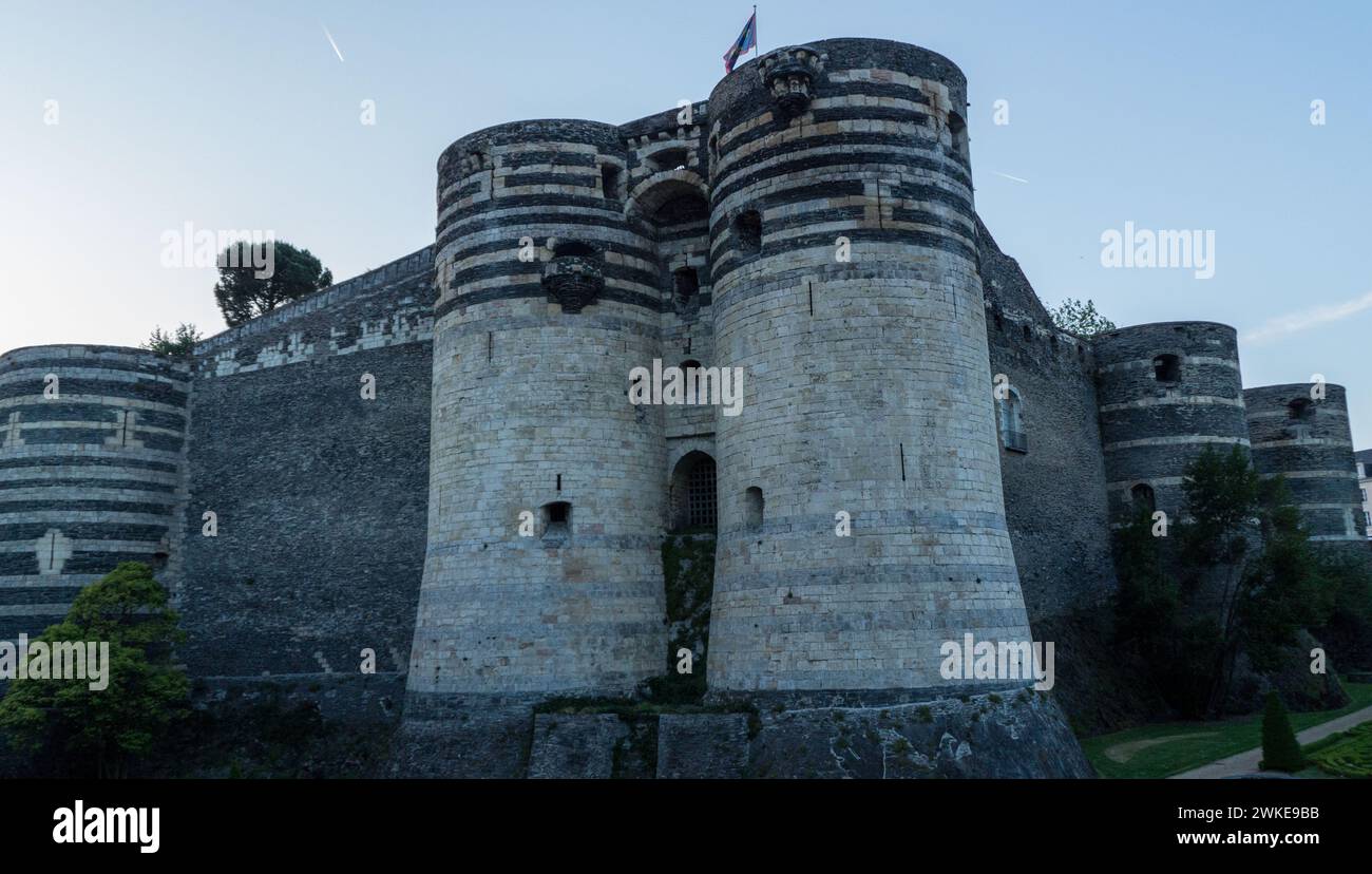 The castle of angers with its imposing towers Stock Photo - Alamy