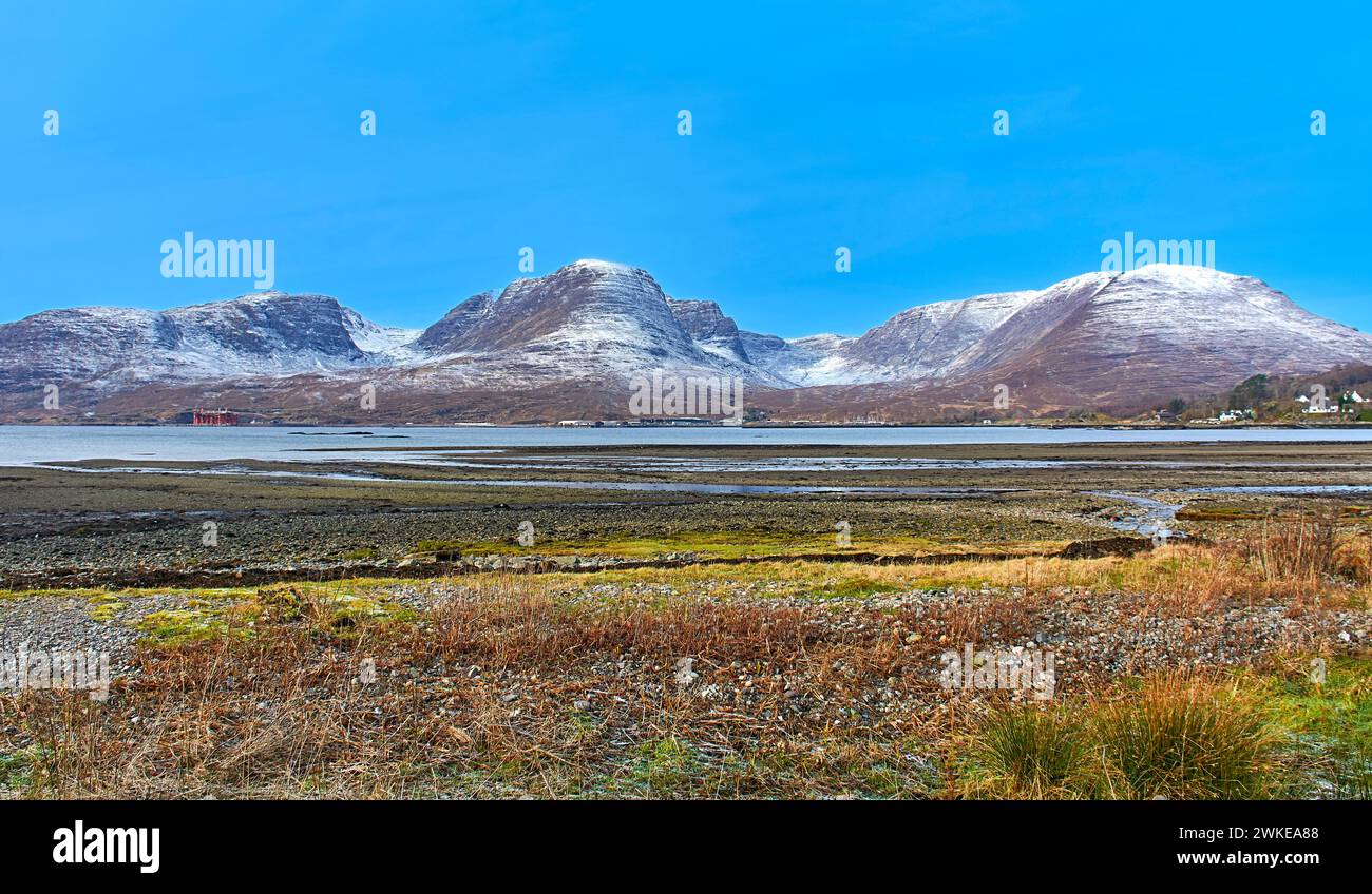 Loch Kishorn the Kishorn Port and Dry Dock red oil platform and the snow dusted Applecross ...