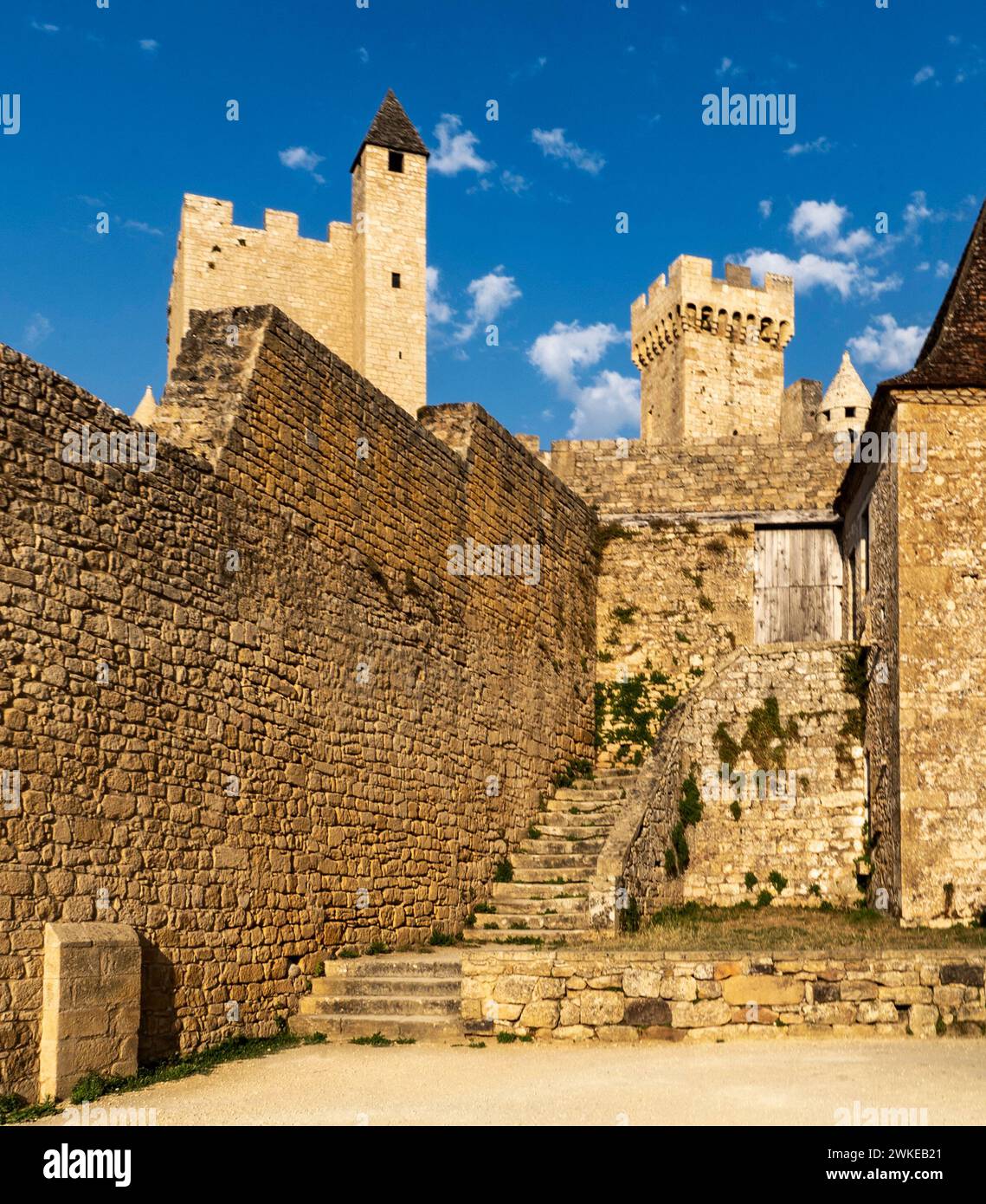 The castle of Beynac in the afternoon with walls and blue sky Stock ...