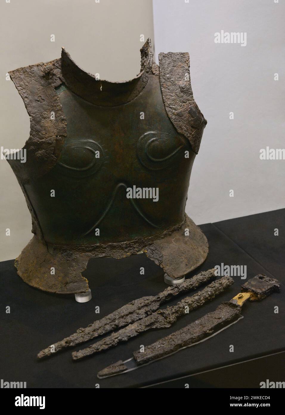 Armour, spear points and sword. Bronze and iron. Late 5th century BC ...