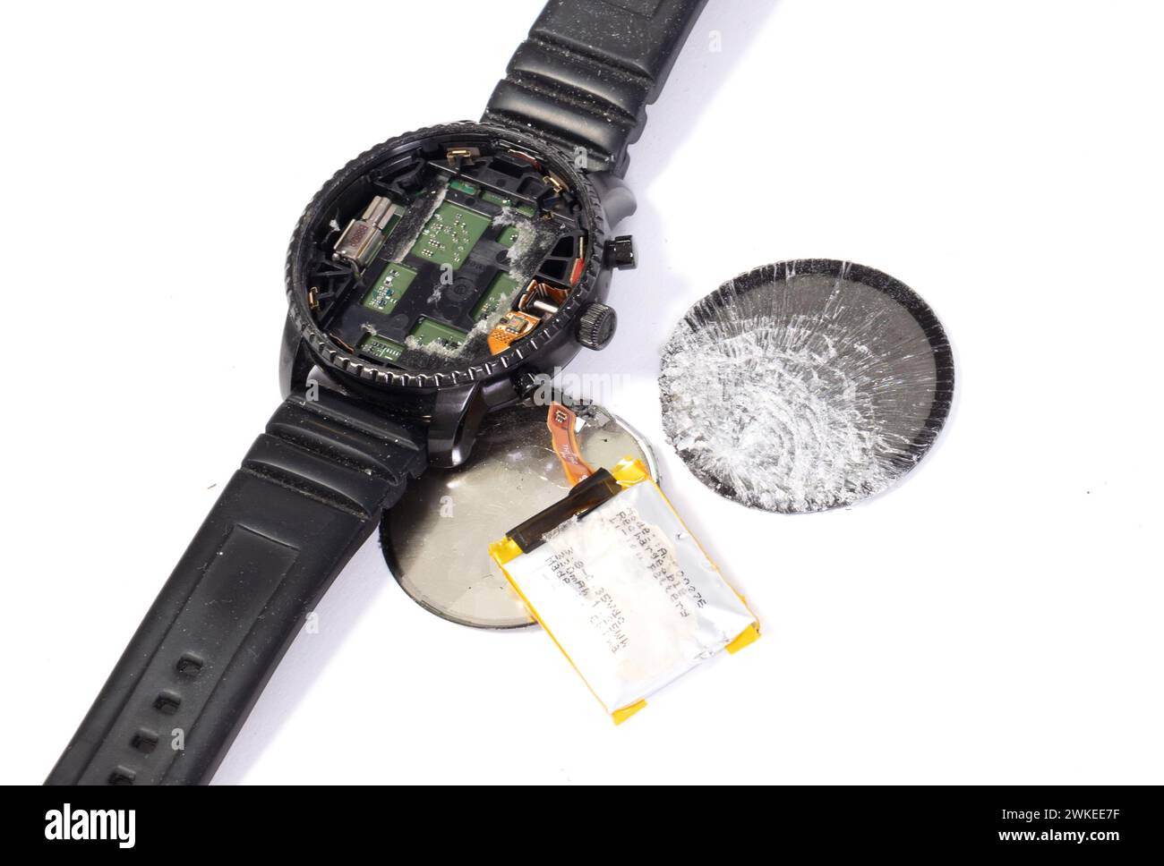 Broken smartwatch isolated on a white background Stock Photo - Alamy