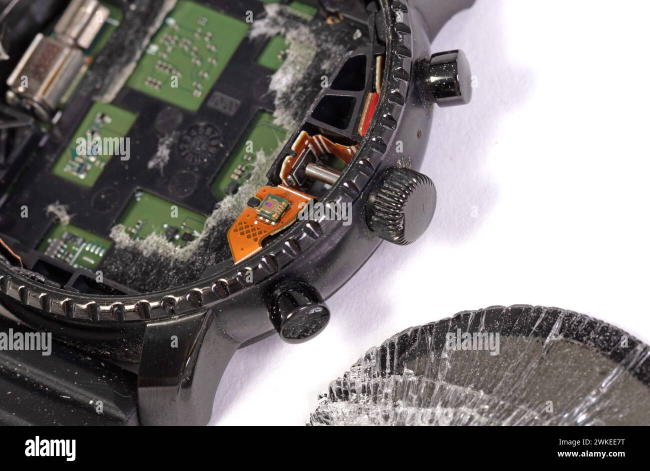 Broken smartwatch isolated on a white background Stock Photo - Alamy