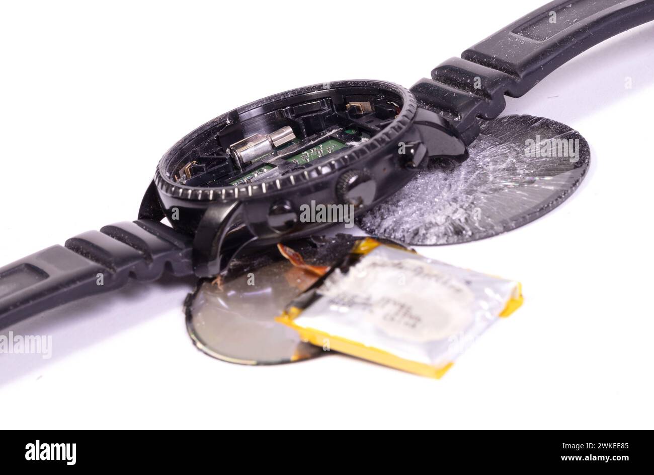 Broken smartwatch isolated on a white background Stock Photo - Alamy