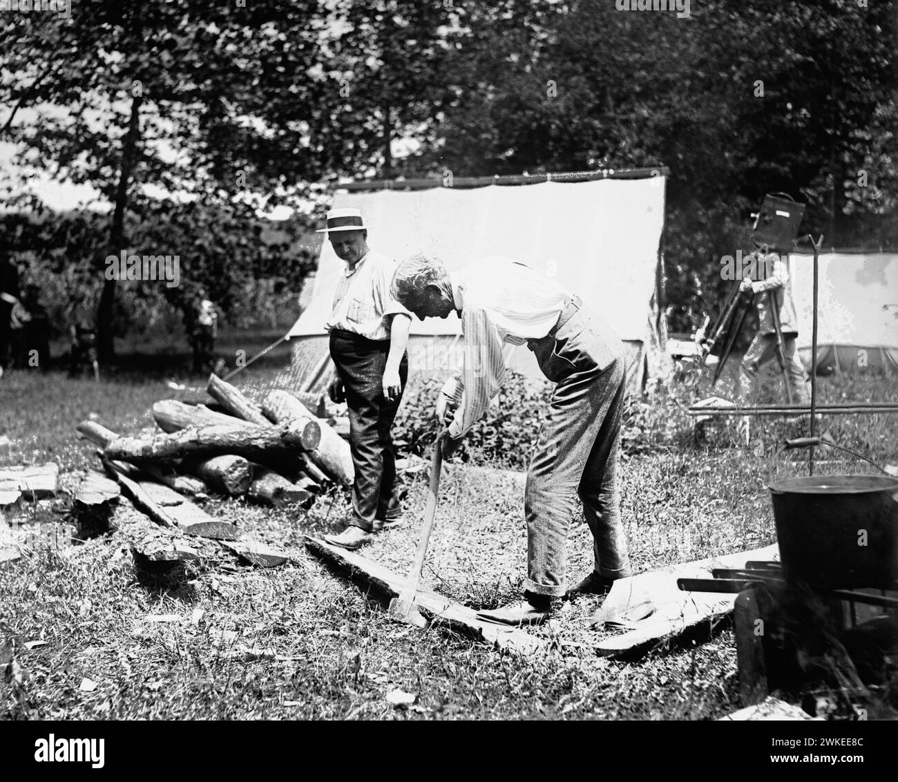 Founder of Ford Motor Company, Henry Ford, chopping wood, 1921 Stock ...