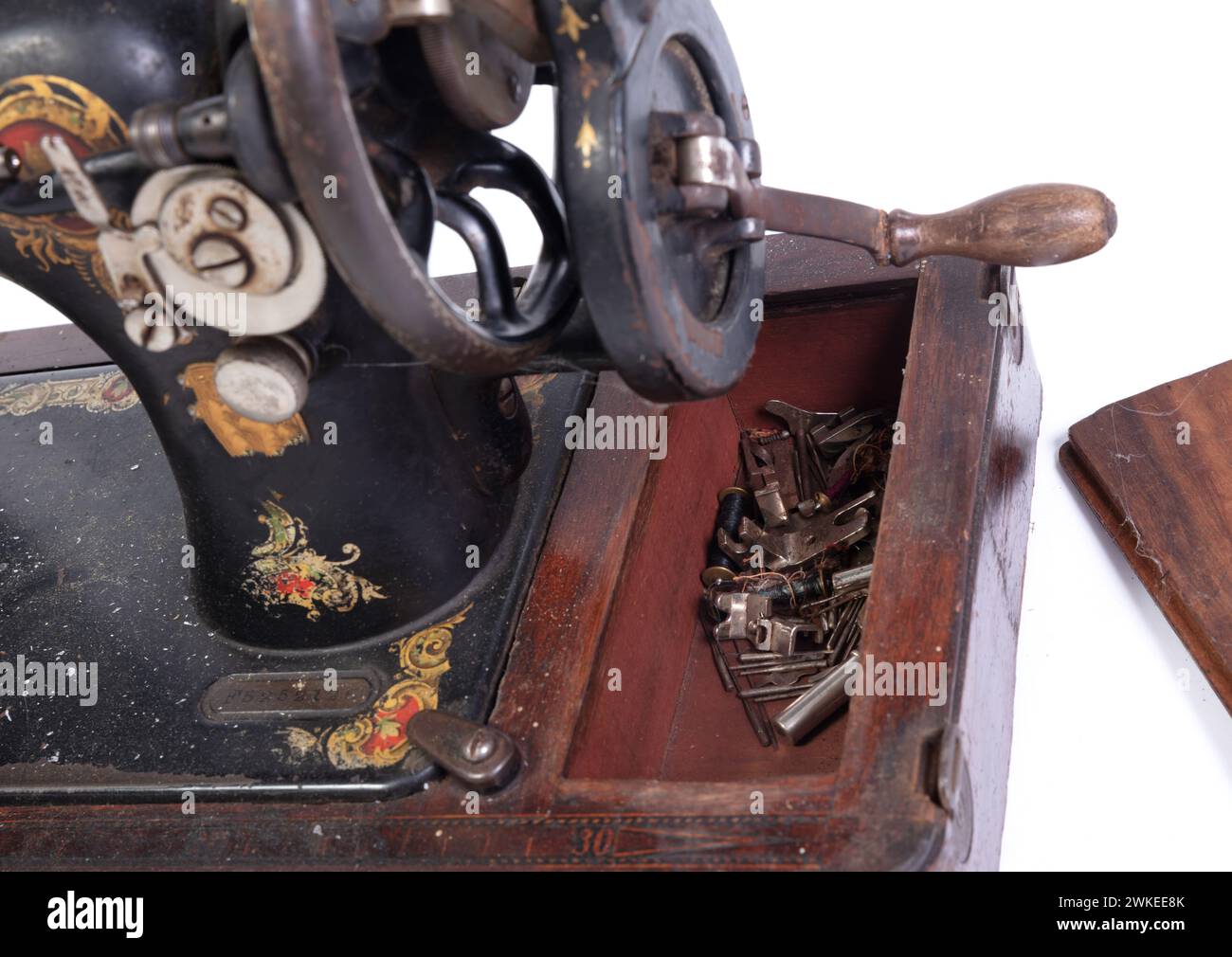 Broken old sewing machine, isolated on white background Stock Photo - Alamy
