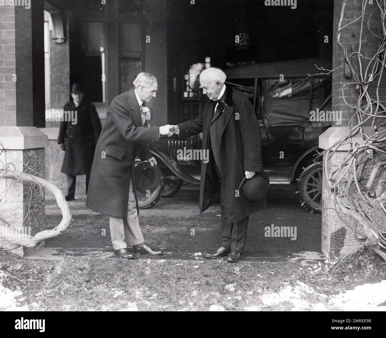 Henry Ford shaking hands with Edison in front of Glenmont on the latter ...