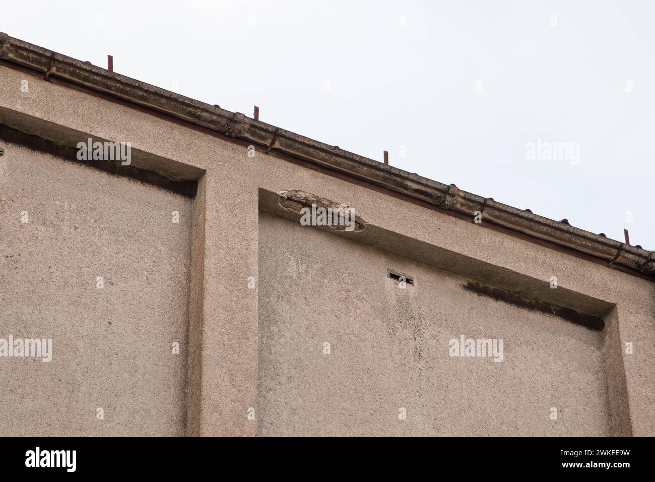 Spalling reinforced concrete Stock Photo - Alamy