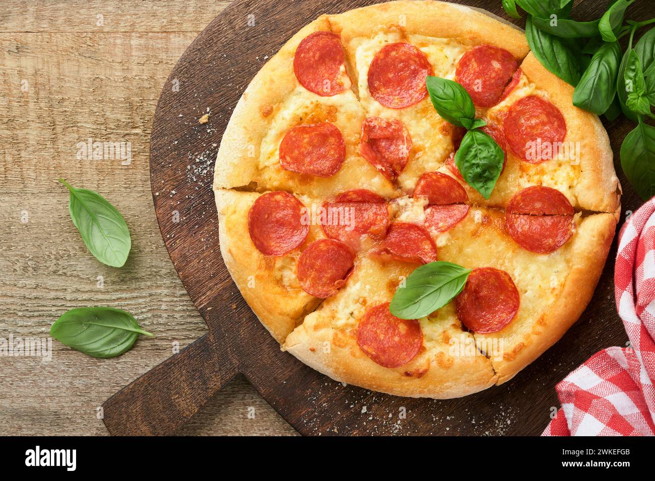 Pepperoni pizza. Traditional pepperoni pizza and cooking ingredients ...