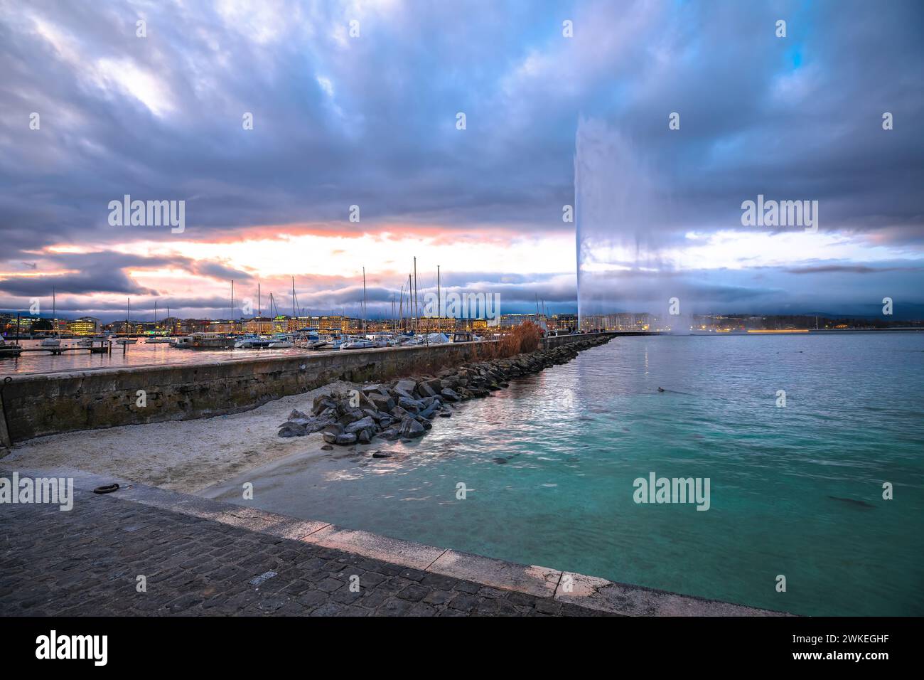 City of Geneva Lac Leman waterfront and Jet d Eau fountain sunset view ...