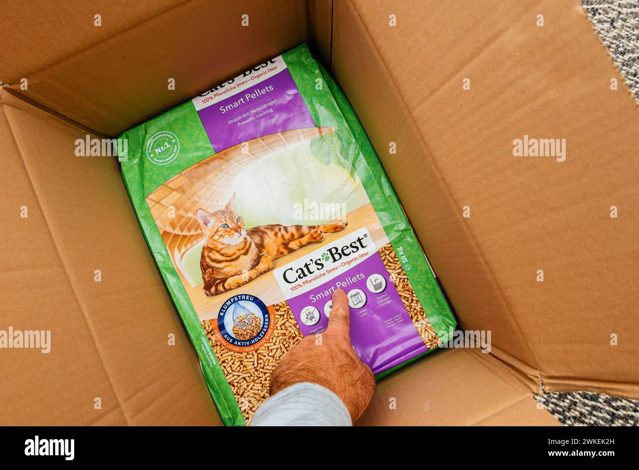 Bremen, Germany Dec 10, 2023: Unboxing Cat's Best Smart Pellets: Male ...