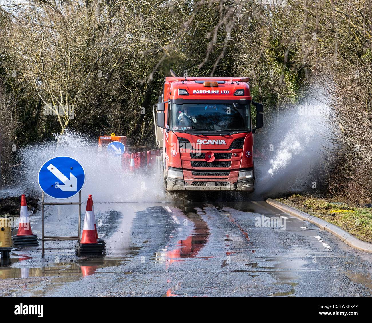 Lorry causing water spray hi-res stock photography and images - Alamy