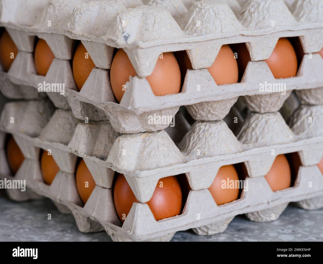 Stack of egg cartons with chicken eggs in them Stock Photo - Alamy