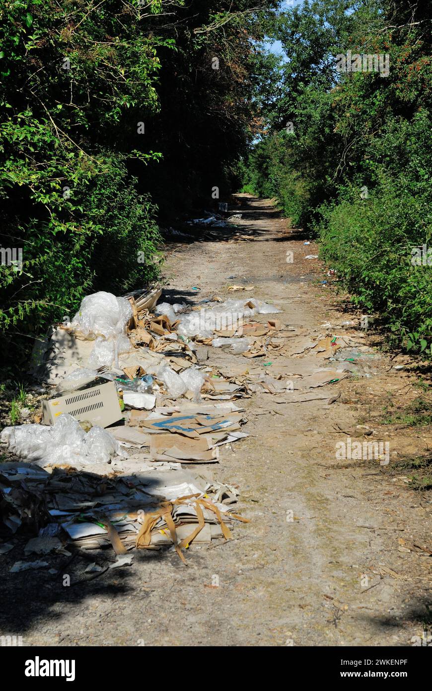 Fly tipping on a public right of way Stock Photo - Alamy