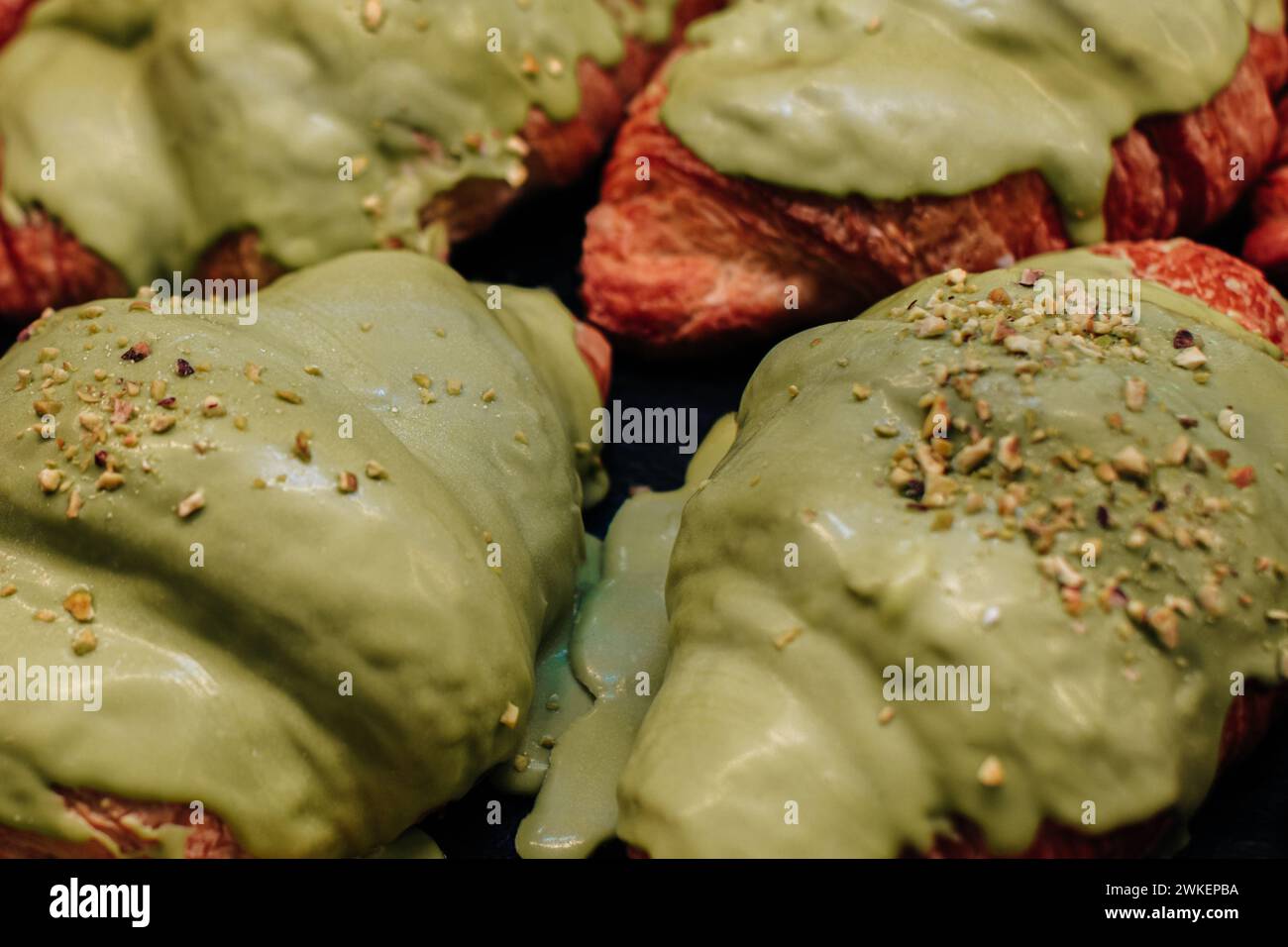 Delicious sweet croissants with green pistachio custard topping Stock ...