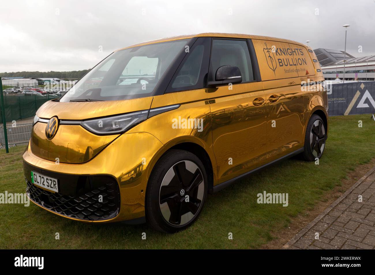 A 2022, Electric Volkswagen ID Buzz Cargo Van, which has a shiny gold ...