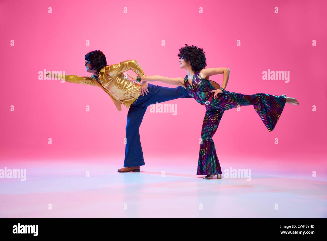 Full length portrait of talented people, dancers duo energetically ...