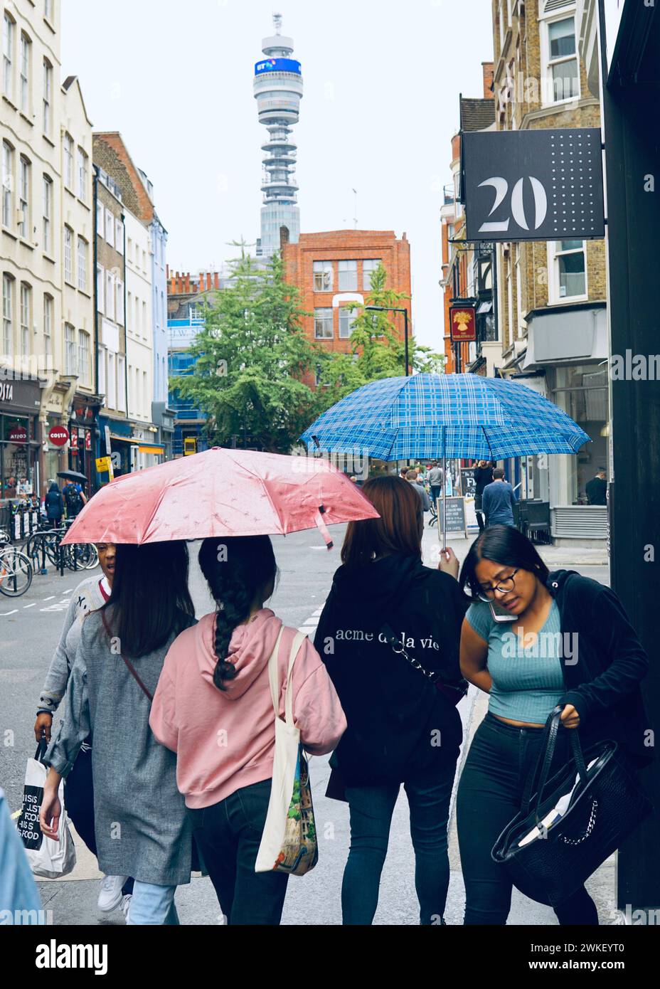 A very wet day in central London on a busy Friday morning on their way ...