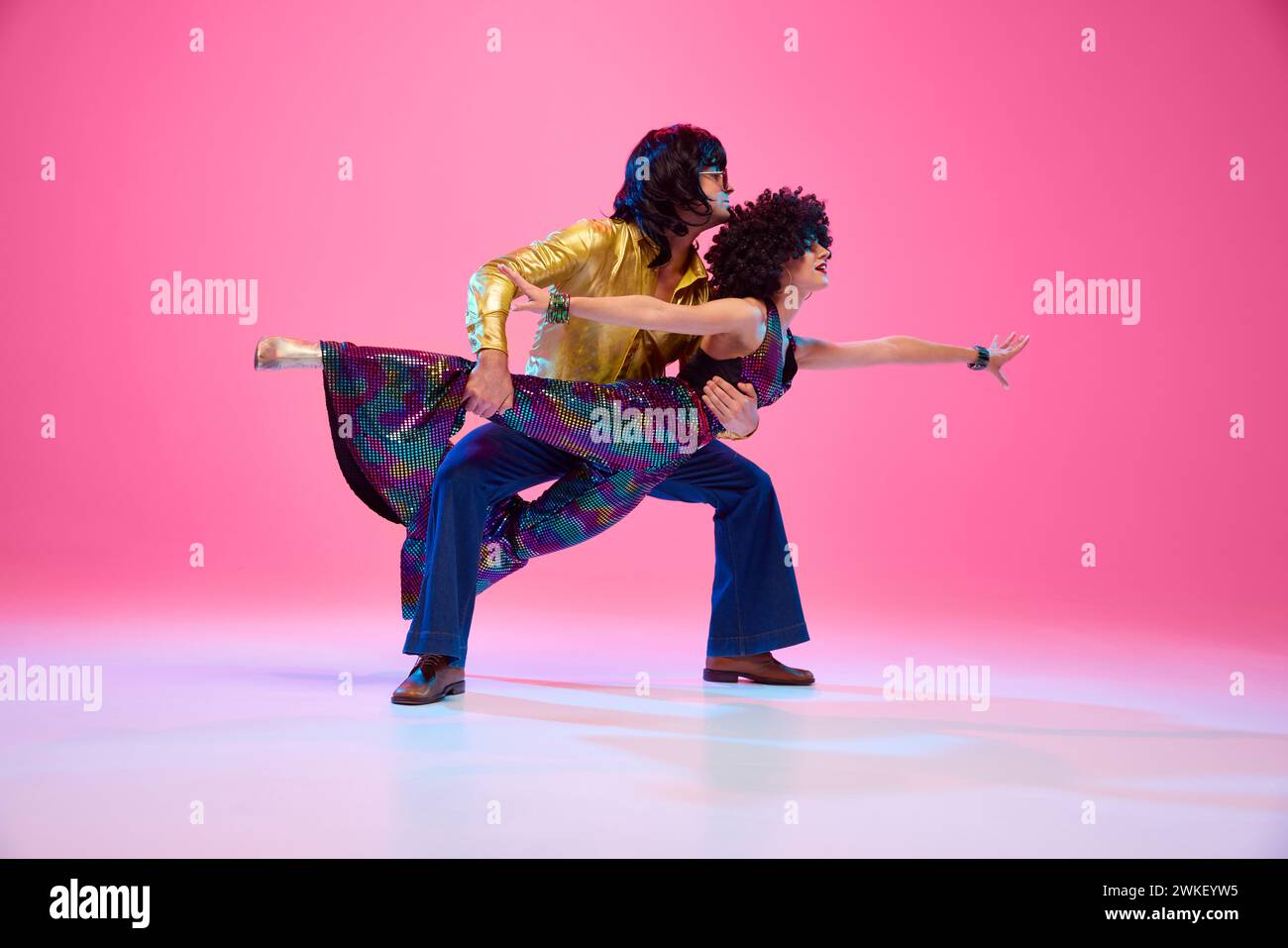 Full length portrait of talented people, dancers duo energetically ...