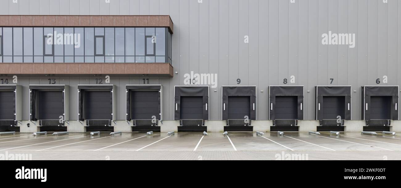 Row of gray loading docks of a warehouse or distbution center Stock ...