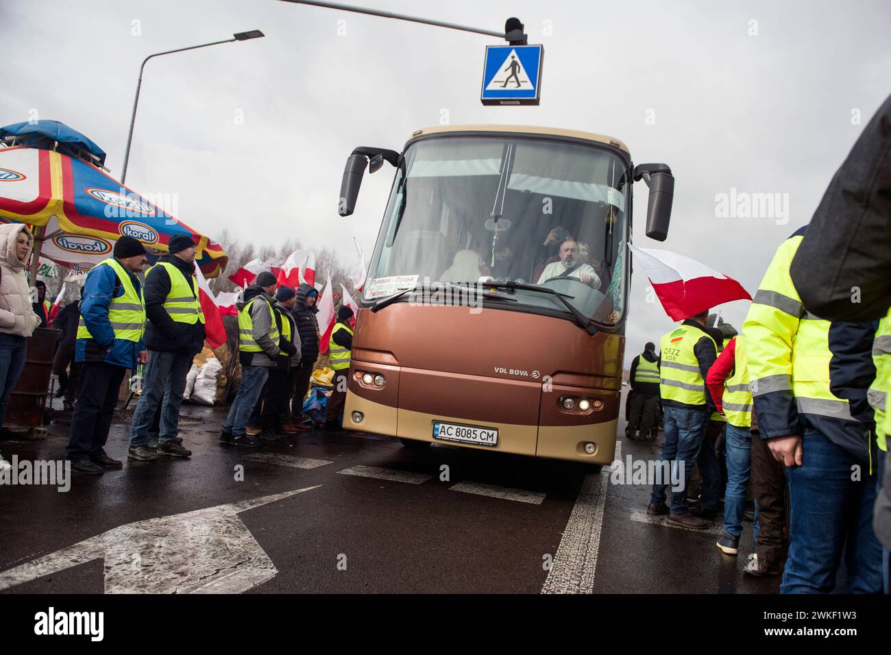 Polish farmers let through a Ukrainian bus at the Dorohusk border ...