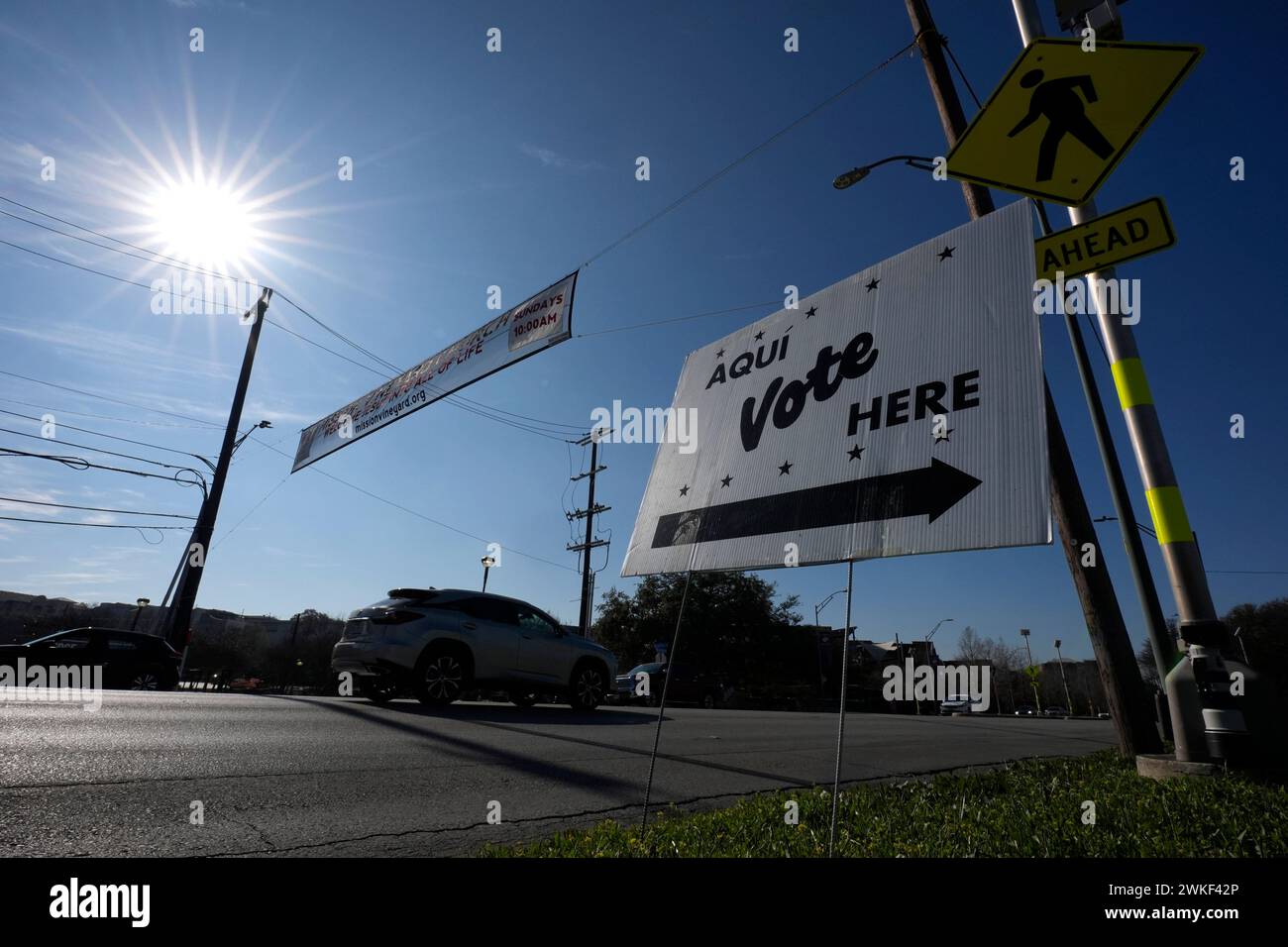 A sign directs voters to an early voting polling site, Tuesday, Feb. 20 ...