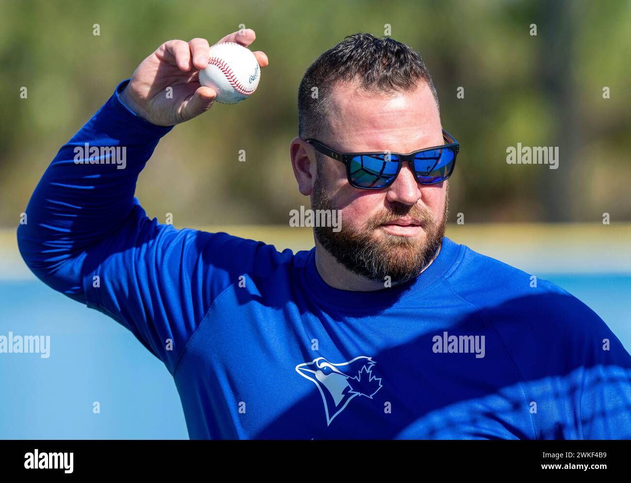 Toronto Blue Jays manager John Schneider throws batting practice at ...