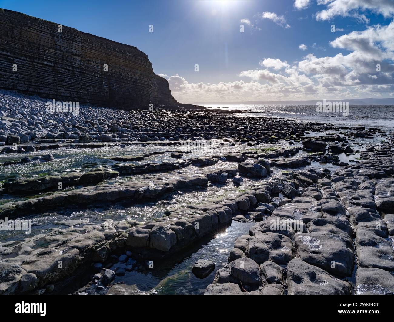 Early morning light on the beach and cliffs at Nash Point on the ...