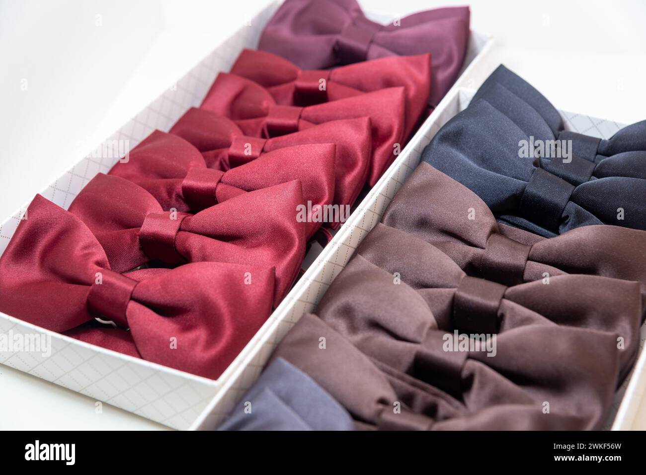 Showcase in a store with beautiful multi-colored bow ties. Many bright ...