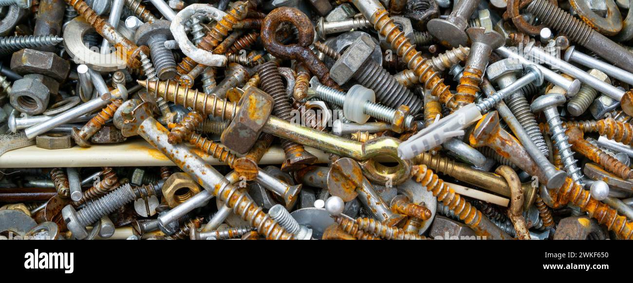 Panorama Old Rusty Bolts and Nuts, Texture Background Stock Photo - Alamy