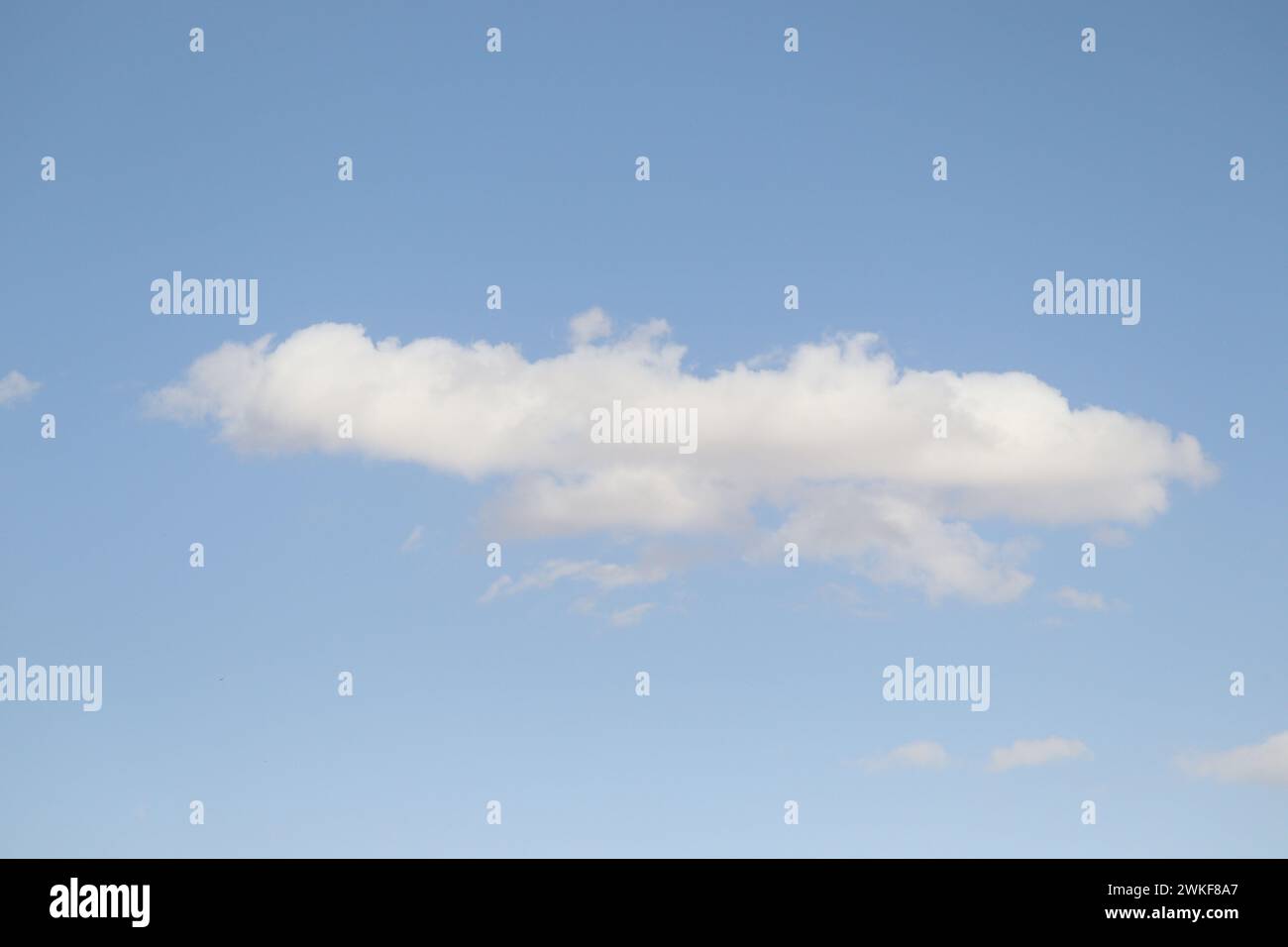 Light clouds in blue sky hi-res stock photography and images - Alamy