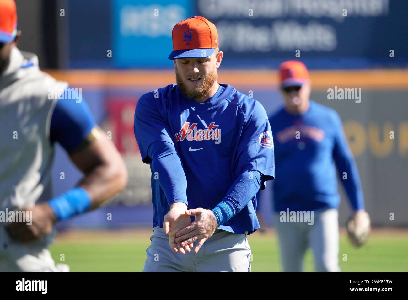 New York Mets' Harrison Bader stretches during a spring training ...