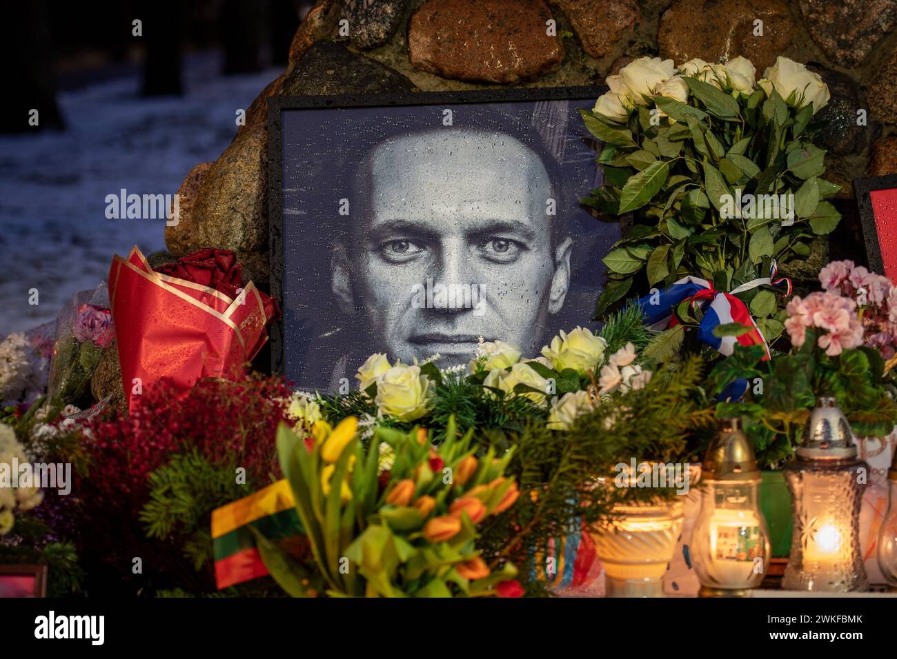 Flowers and candles laid at spontaneous memorial for Russian opposition ...