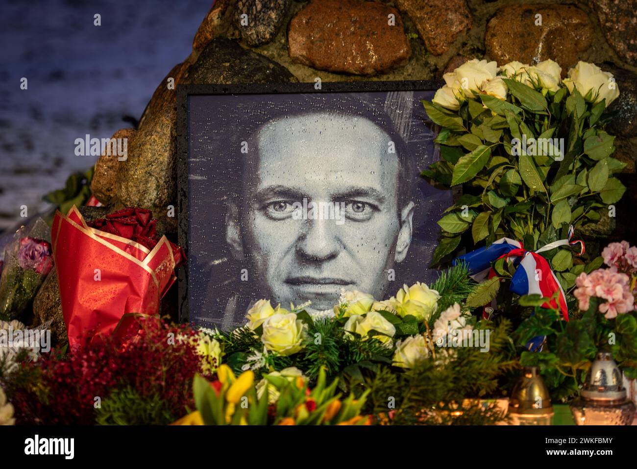 Flowers and candles laid at spontaneous memorial for Russian opposition ...