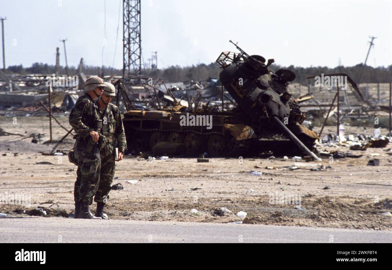 First Gulf War: 17th March 1991 U.S. Army soldiers stand near a burned ...